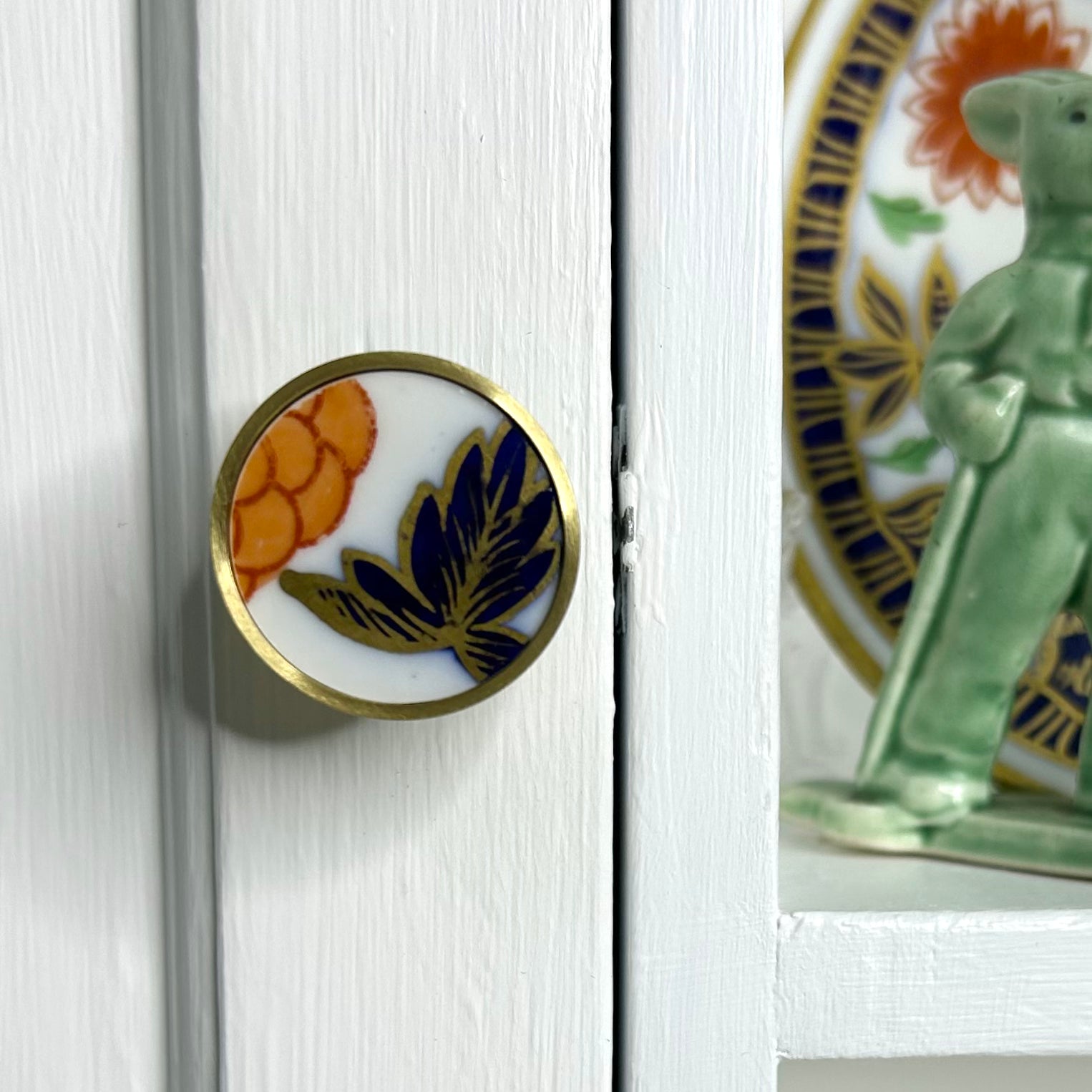 1910-16 Late Foley Pre-Shelley Orange and Navy Door Knob